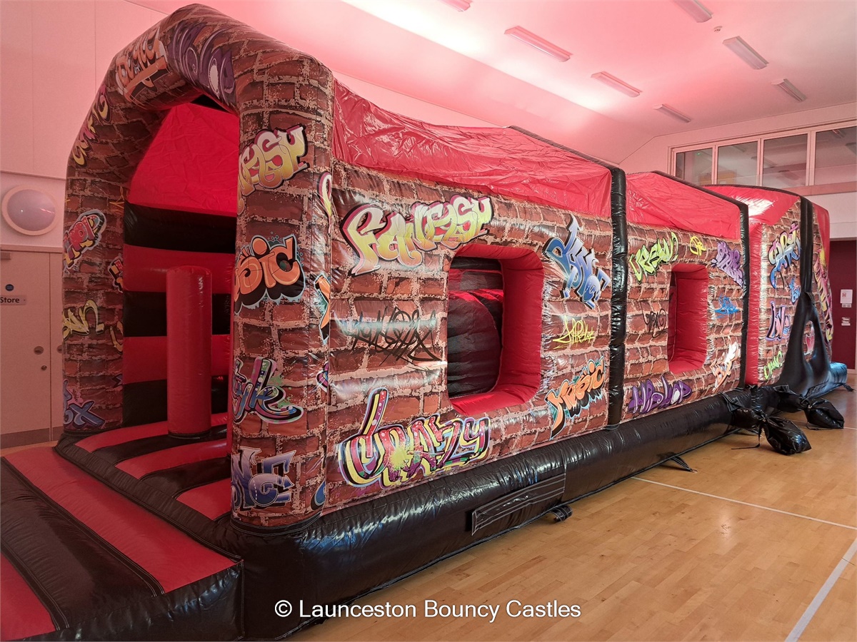The all-new 45ft Graffiti inflatable obstacle course - Hire in exeter ...